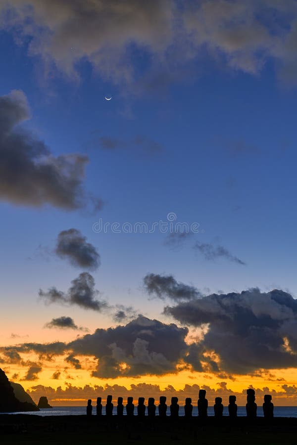 Vertical Shot of the Moai Stone Statues in a Row at Sunset, Chile Stock ...