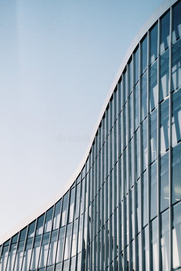 Vertical Shot of a Modern Building with Many Windows Stock Photo ...