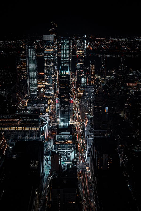Vertical Shot of Modern Buildings during the Dark Night Stock Photo ...