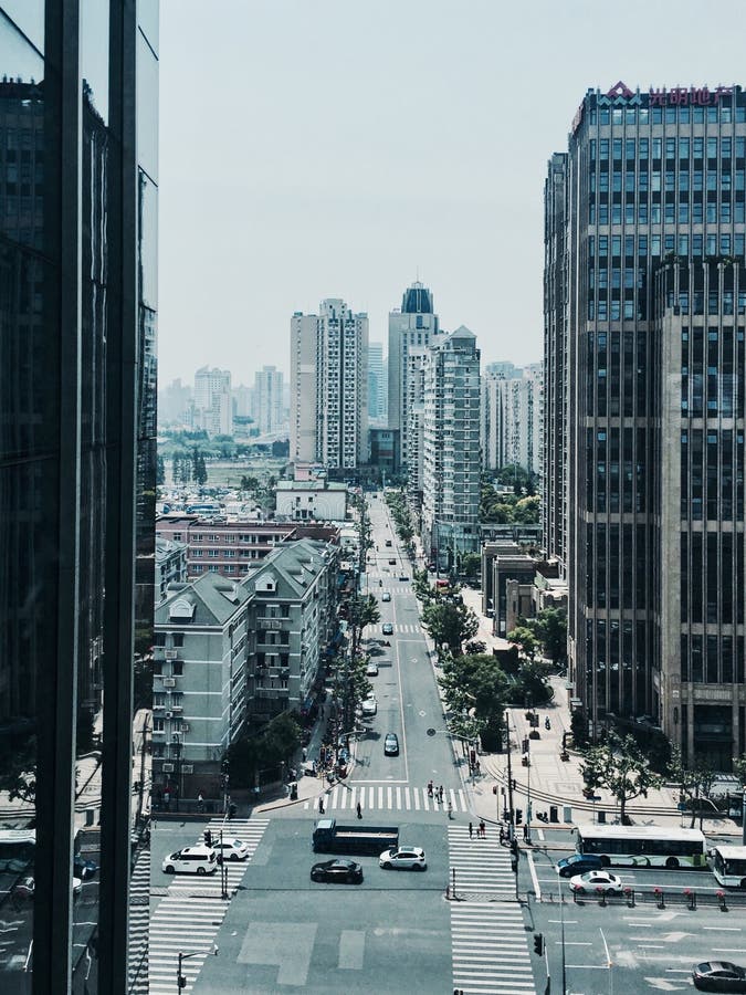 Vertical Shot of a Modern City with Skyscrapers Stock Photo - Image of ...
