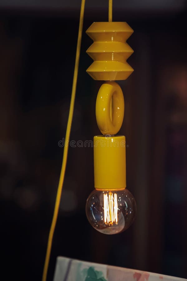 Vertical Shot of a Modern Lamp with a Single Lamp Bulb Stock Image ...