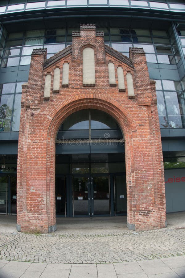 Vertical Shot of a Monument Gate in Front of a Building in Berlin ...