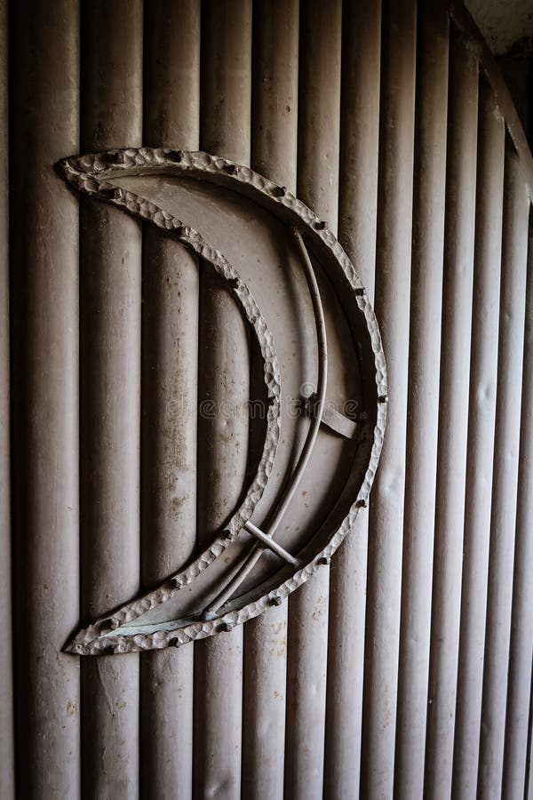 Vertical Shot of a Moon-shaped Wooden Wall Decor Stock Image - Image of ...