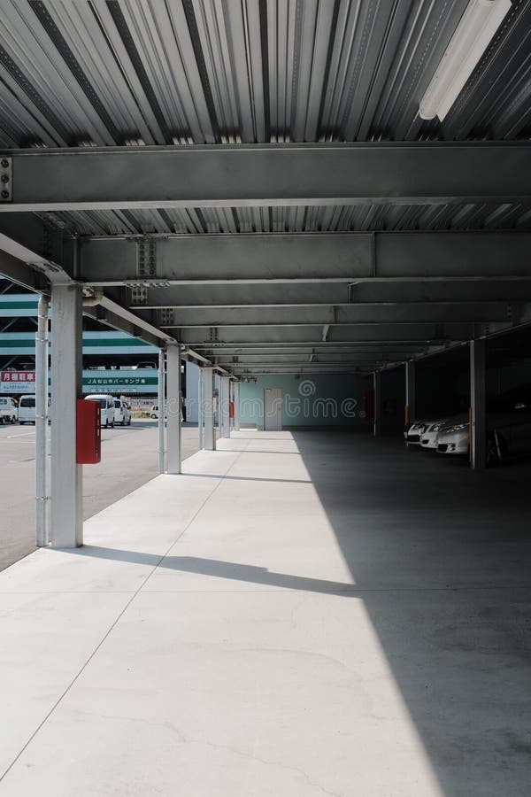 Vertical Shot of a Multistorey Car Park with Cars Stock Photo - Image ...