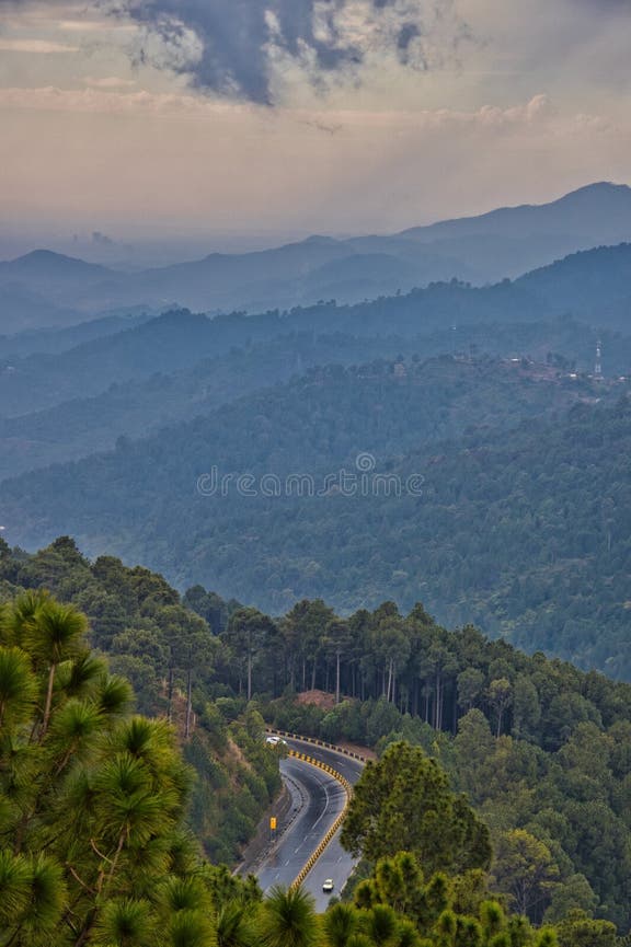Vertical Shot of the Murree Expressway on the Mountain Covered in Trees ...