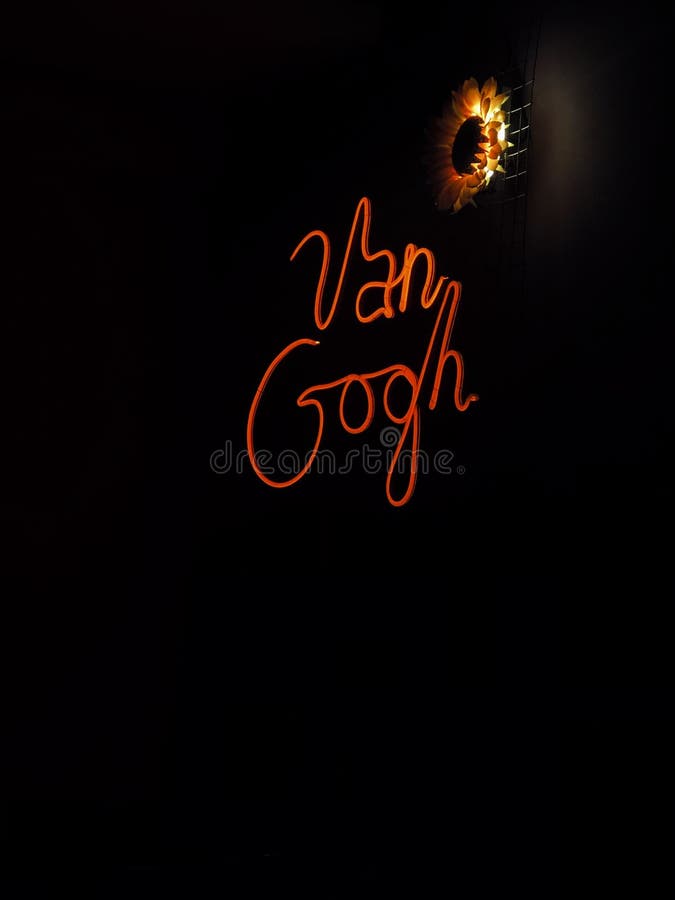 Vertical Shot of the Name Van Gogh Written in Cursive Dark Orange Color ...