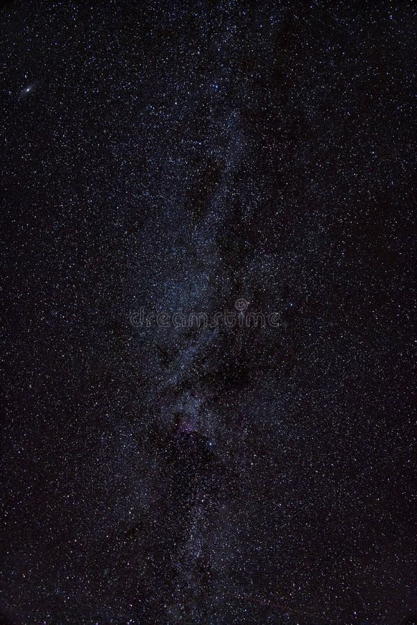 Vertical Shot of a Night Sky Milky Way Stock Image - Image of vertical ...