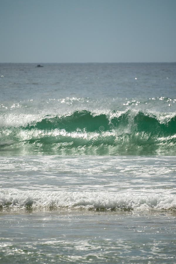 Vertical Shot of Ocean Waves Breaking Beach Stock Image - Image of ...