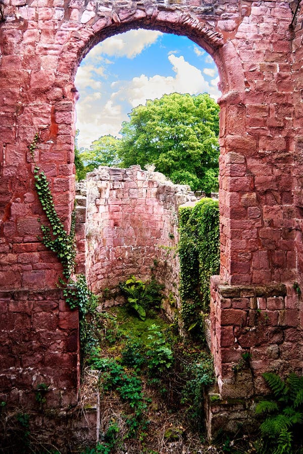 Vertical Shot of an Old Arched Gate of the Castle Ruins Stock Photo ...