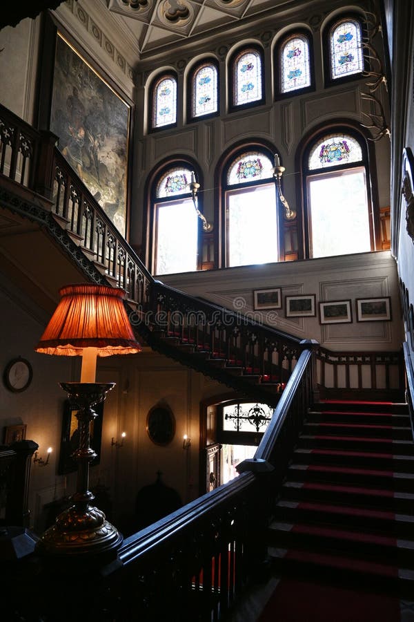 Vertical Shot of an Old Building Interior with Stairs and Vitrage Glass ...