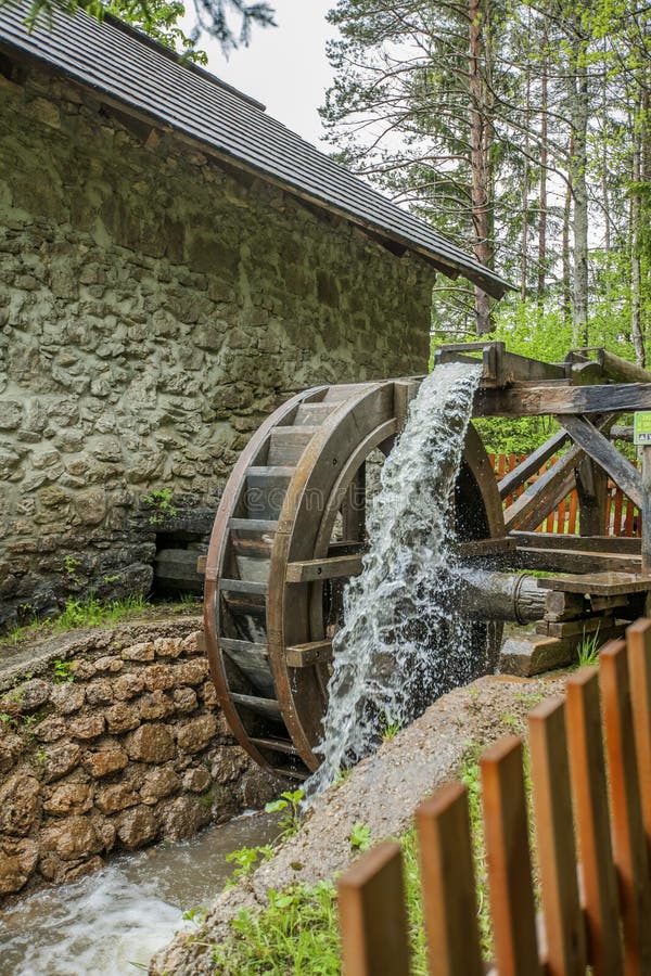 Vertical Shot of an Old Building a Water Mill in Slovenia Stock Photo ...