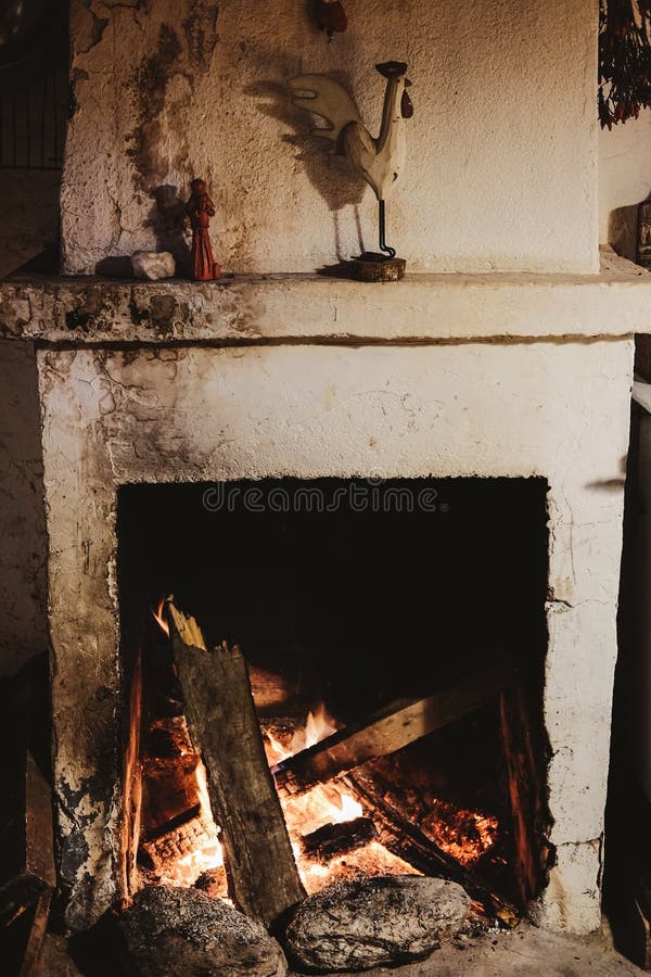 Vertical Shot of an Old Fireplace with a Chicken Figurine on Top Stock ...