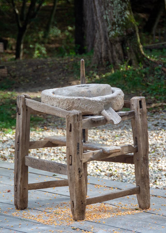 Vertical Shot of an Old Manual Stone Mill for Crushing Grain on the ...