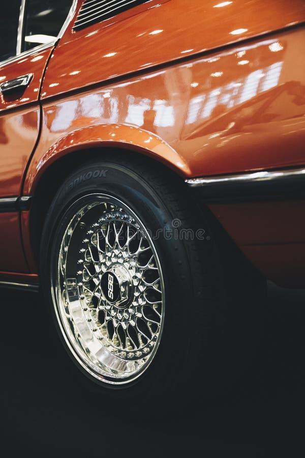 Vertical Shot of an Old Red Car with Shiny Rims Stock Photo - Image of ...