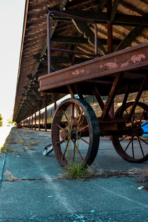 Vertical Shot of an Old Rusty Cart at the Train Station. Stock Image ...