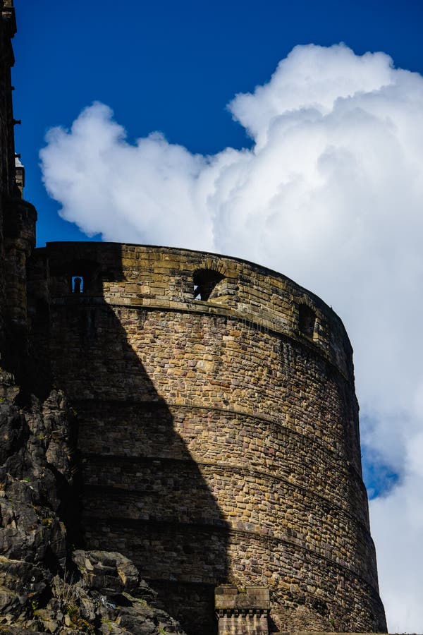 Vertical Shot of the Old Tower of the Edinburgh Castle Under a Cloudy ...