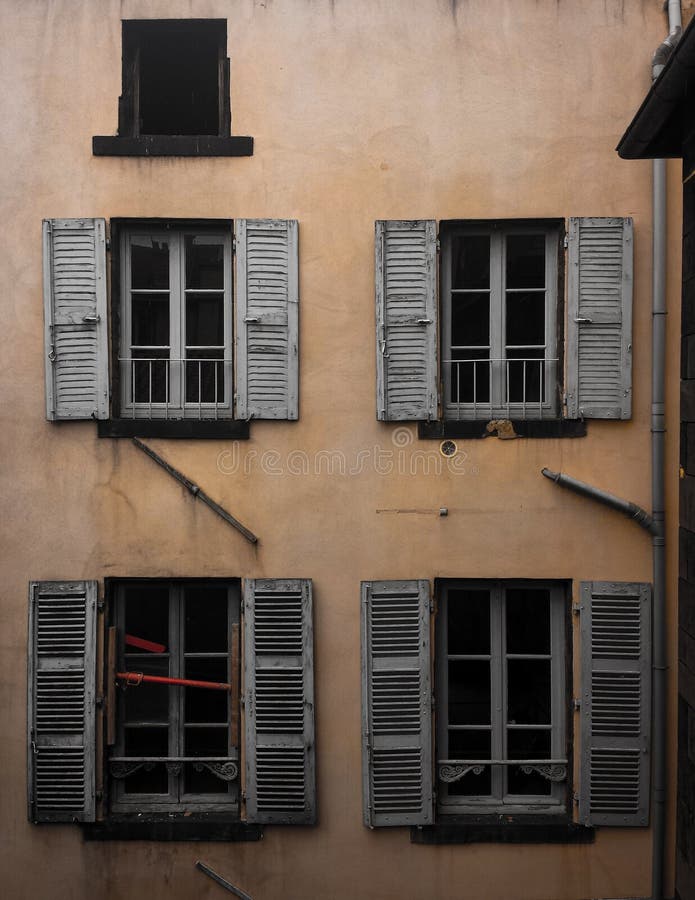 Vertical Shot of the Old Windows with the Wooden Covers from Outside ...