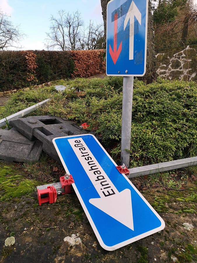 Vertical Shot of One Standing and One Fallen Sign on the Street Stock ...