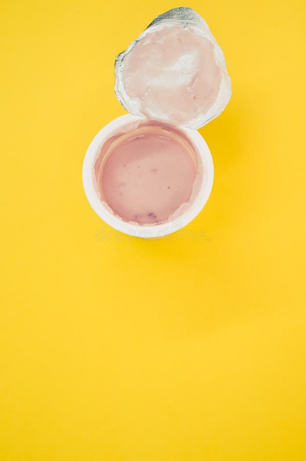 Vertical Shot of an Opened Plastic Container of Fruit Yogurt on a ...