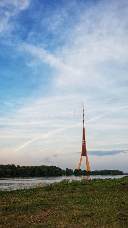 Vertical Shot of an Orange Tower during Daytime Stock Photo - Image of ...