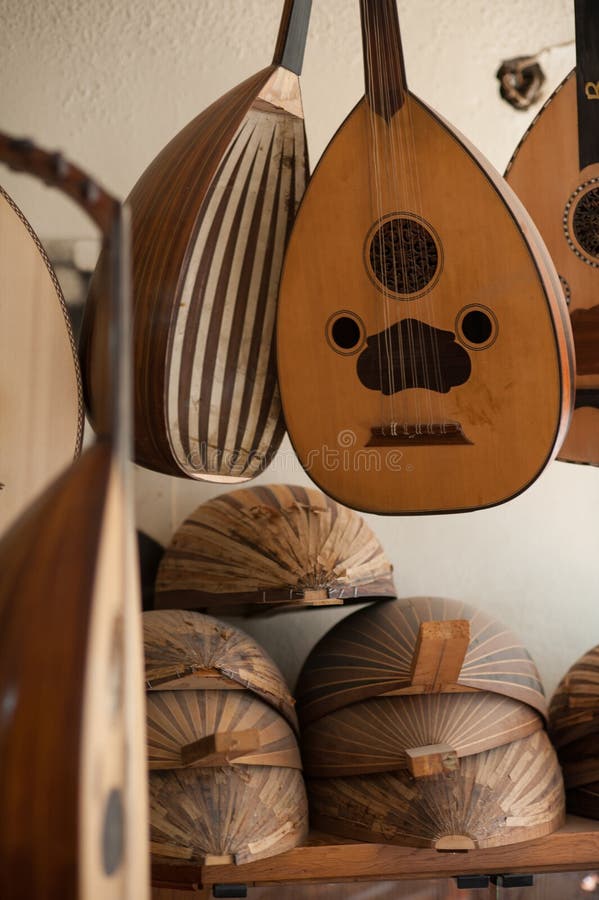 Vertical Shot of Oud Musical Instruments Hanging on the Wall Stock ...