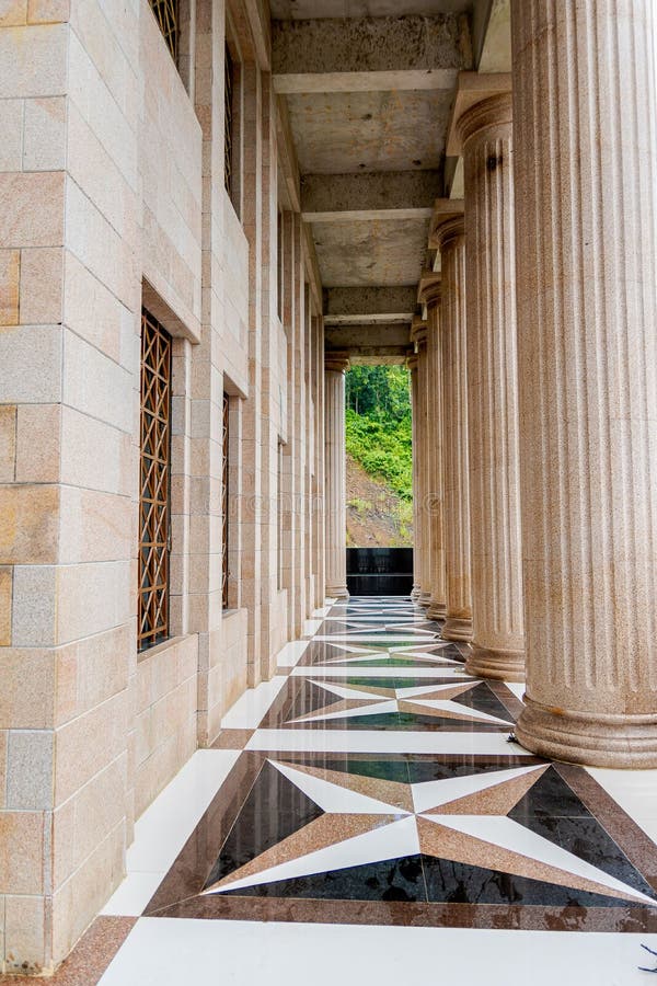 Vertical Shot of an Outdoor Corridor with Columns Stock Image - Image ...