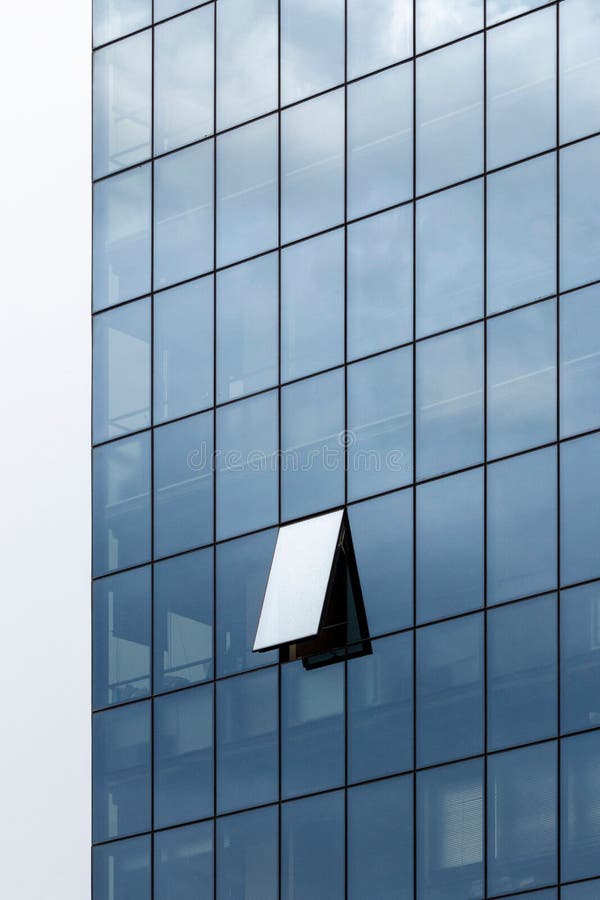 Vertical Shot of the Outer Part of Glass Windows of a Modern and Well ...