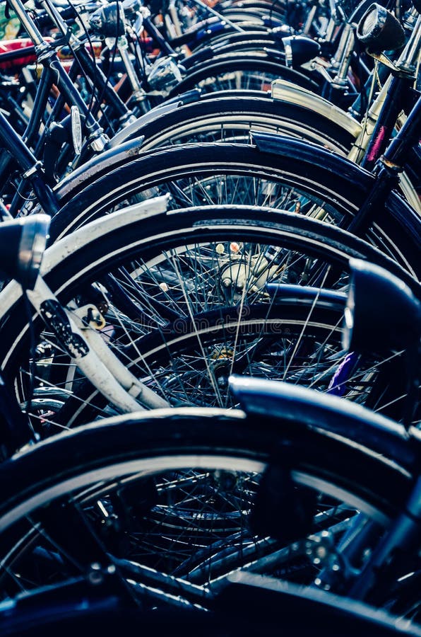 Vertical Shot of Parked Bicycle Wheels Pattern Stock Photo - Image of ...
