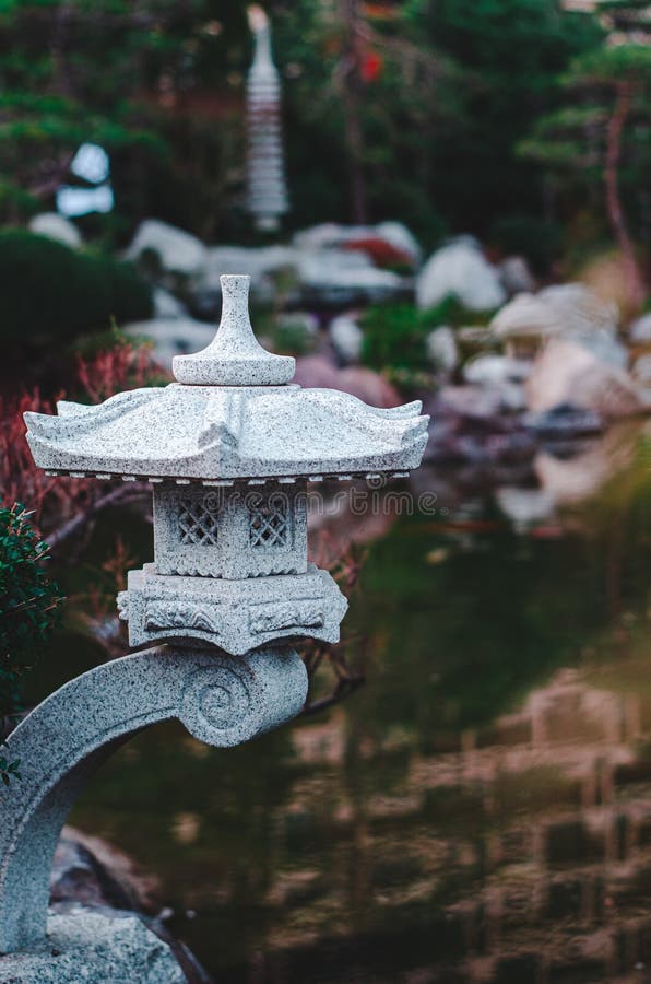Vertical Shot of a Part of a Stone Railing in a Park Stock Image ...
