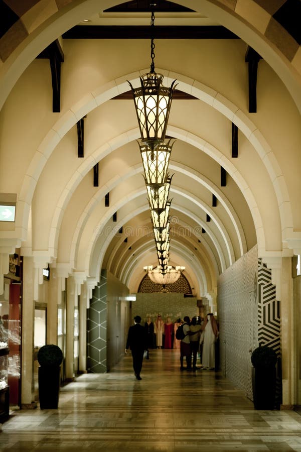 Vertical Shot of People Walking through the Corridor at Dubai Mall ...