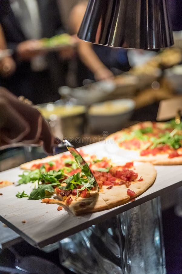 Vertical Shot of a Person Making Delicious Pizza for a Wedding ...