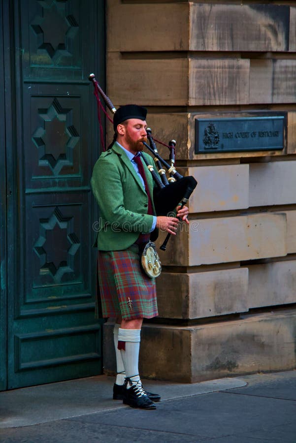 Vertical Shot of the Piper Playing in Edinburgh Editorial Image - Image ...