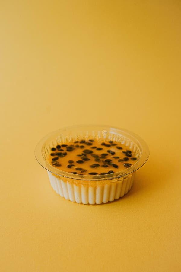 Vertical Shot of a Plastic Container with Creamy Pudding and ...