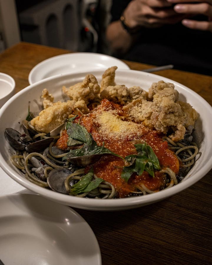 Vertical Shot of a Plate of Fried Chicken Pasta Stock Photo - Image of ...