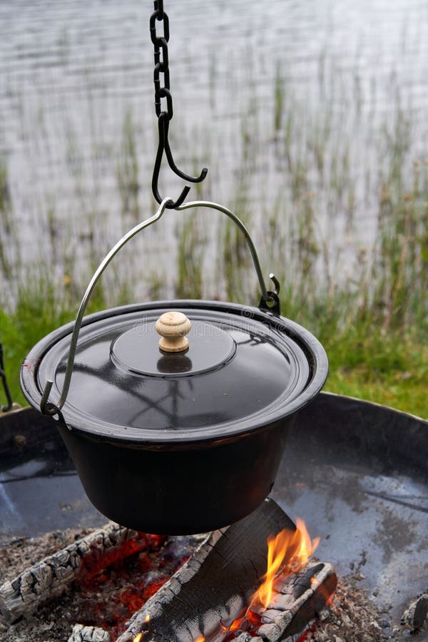 Vertical Shot of a Pot Cooking on a Campfire Stock Image - Image of ...