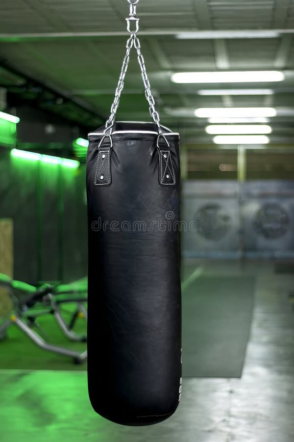 Vertical Shot of a Punching Bag in a Gym Stock Photo - Image of ...
