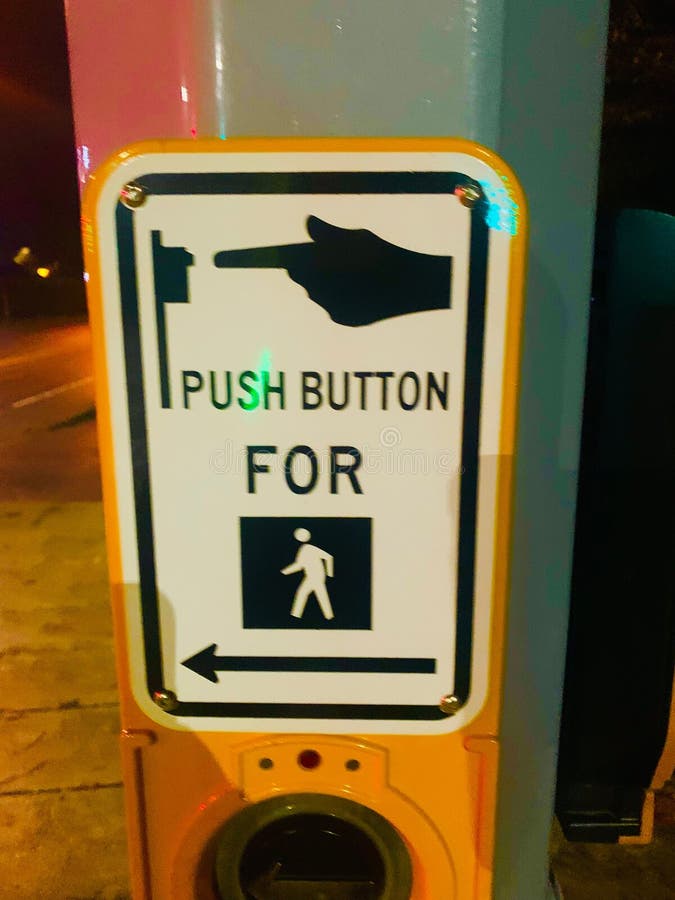 Vertical Shot of a Push Button Sign for a Pedestrian Street Light on ...