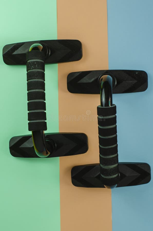 Vertical Shot of Push-up Racks on a Fitness Matte Stock Photo - Image ...