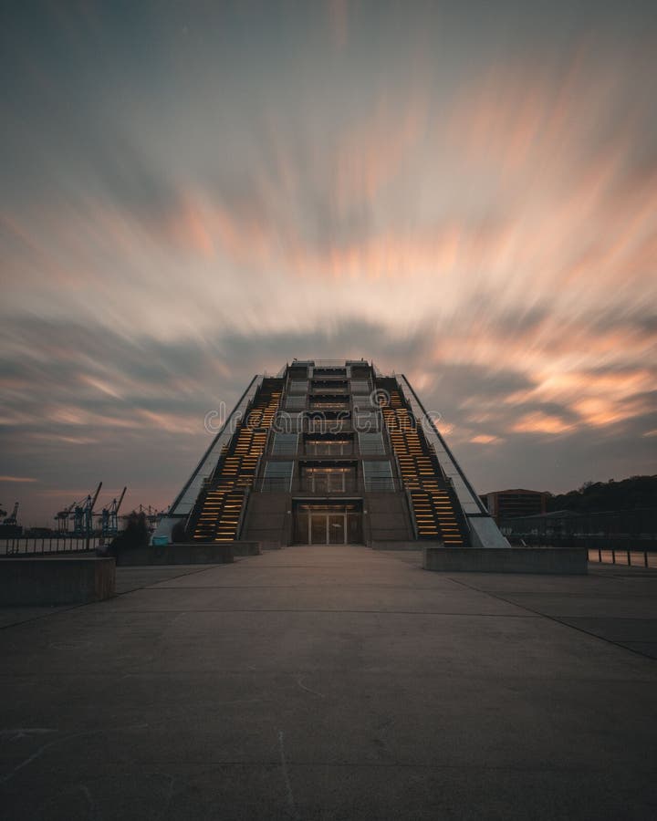 Vertical Shot of a Pyramid Shaped Building at Sunset in an Empty ...