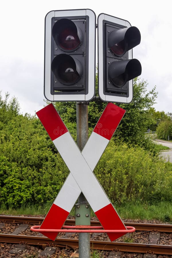 Vertical Shot of Railway Light Signs and an `X` Symbol for Stop beside ...