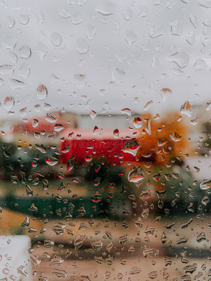 Vertical Shot of Raindrops on a Window Stock Photo - Image of wallpaper ... Vertical Shot of Raindrops on a Window Stock Photo - Image of wallpaper ...
