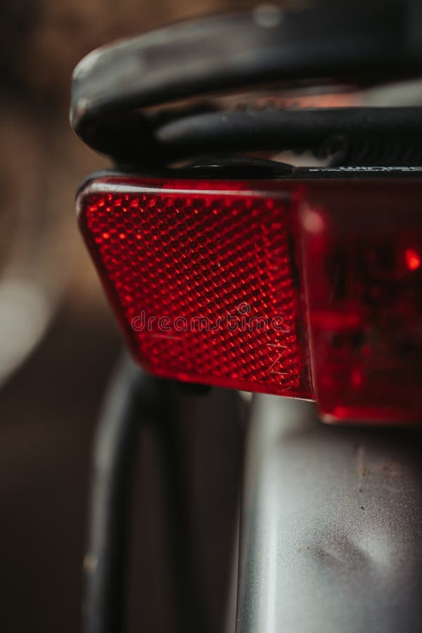 Vertical Shot of a Red Retroreflector on a Back of a Bike Stock Photo ...