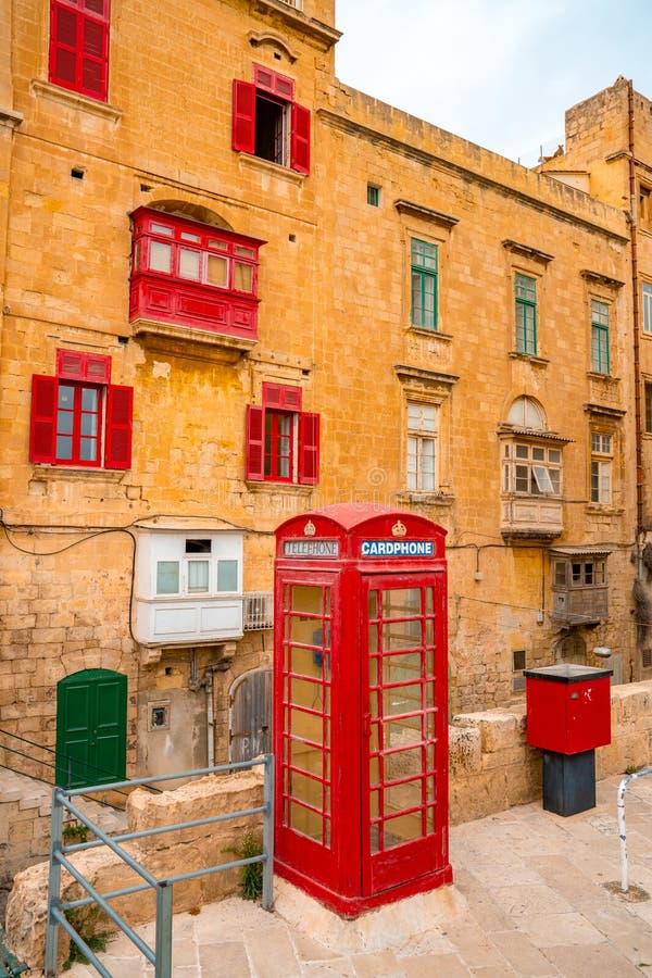 Vertical Shot of a Red Vintage Telephone Box in Valletta, Malta Stock ...