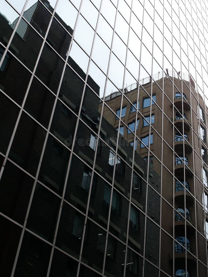 Reflection of Architecture on Modern Office Building, a Glass Wall of ...