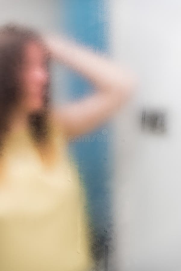 Vertical Shot of the Reflection of Young Female on a Moist Mirror Stock ...