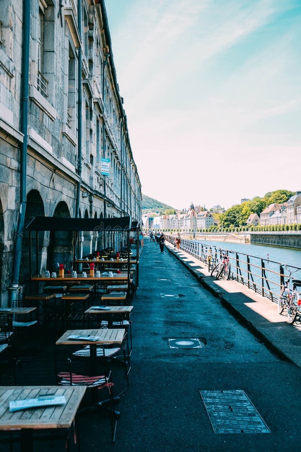 Vertical Shot of the Restaurants on the Sidewalk by a Canal Stock Image ...