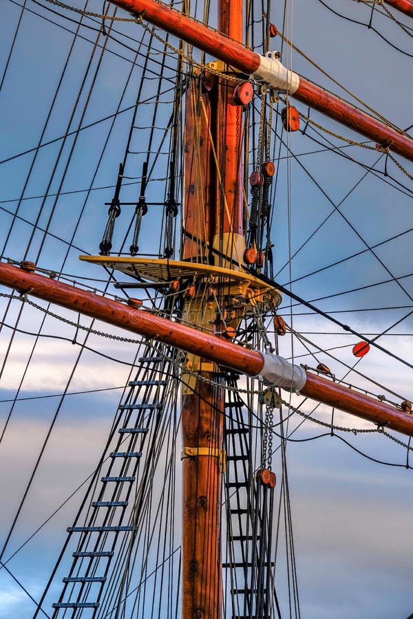 Vertical Shot of the Rigging and Mast of a Sailing Ship Under a Cloudy ...
