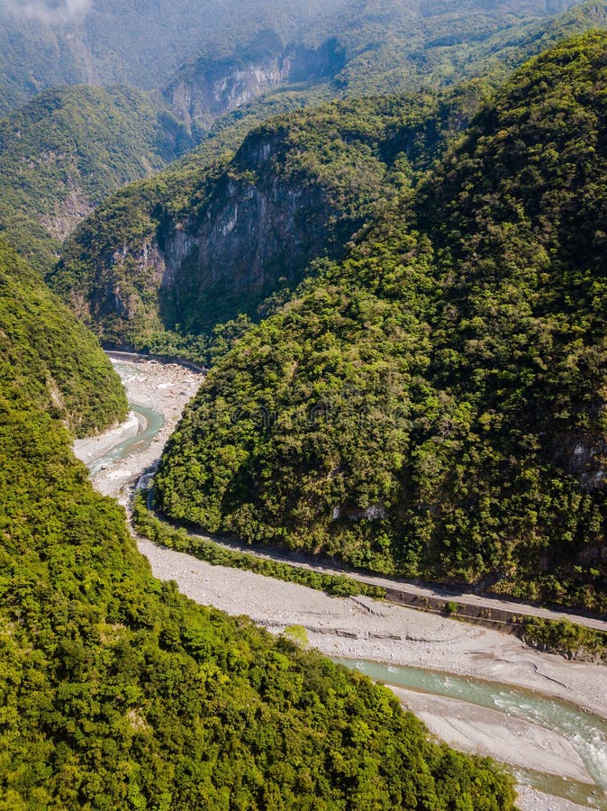 Vertical Shot of a River between Forest Mountains Stock Image - Image ...