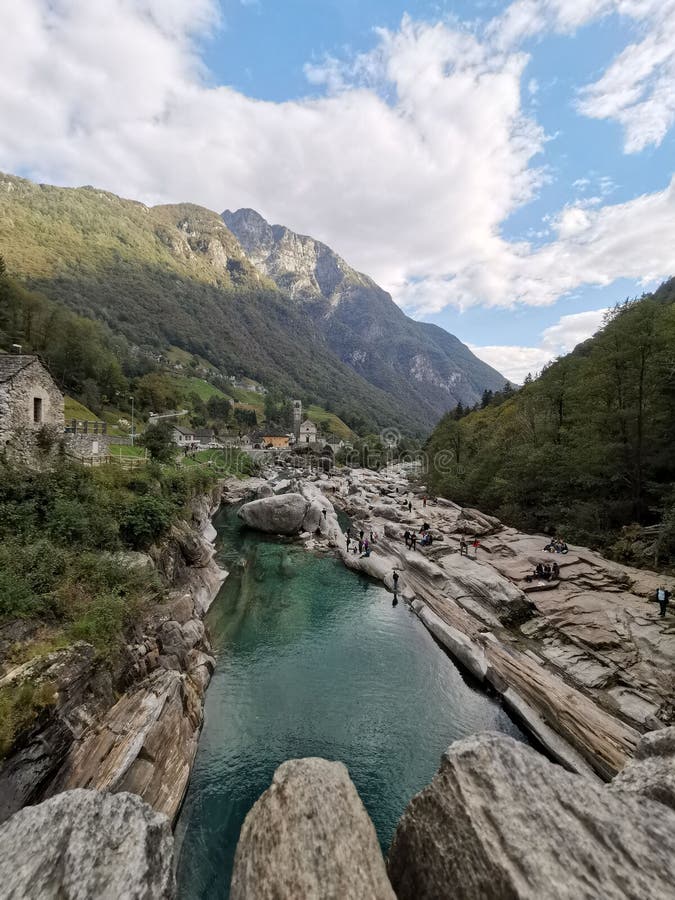 Vertical Shot of a River with an Imposing Mountainscape at Valle ...