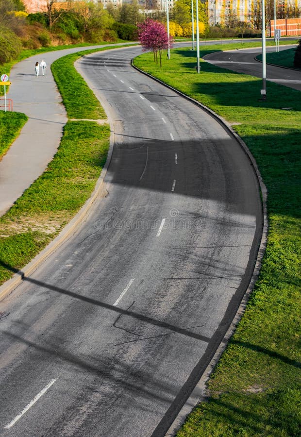 Vertical Shot of a Road Alongside a Sidewalk in Prague on a Sunny ...